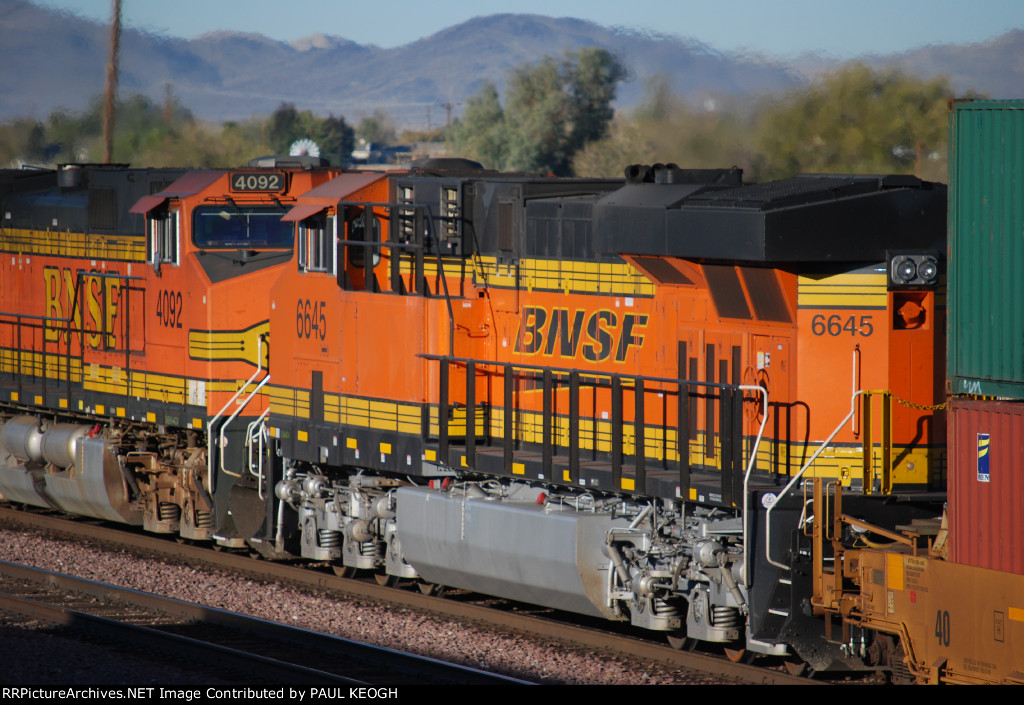 BNSF 6645 passes me by as the Hot Exhaust flows out her V-12 GEVO 4,400 HorsePower Engine.